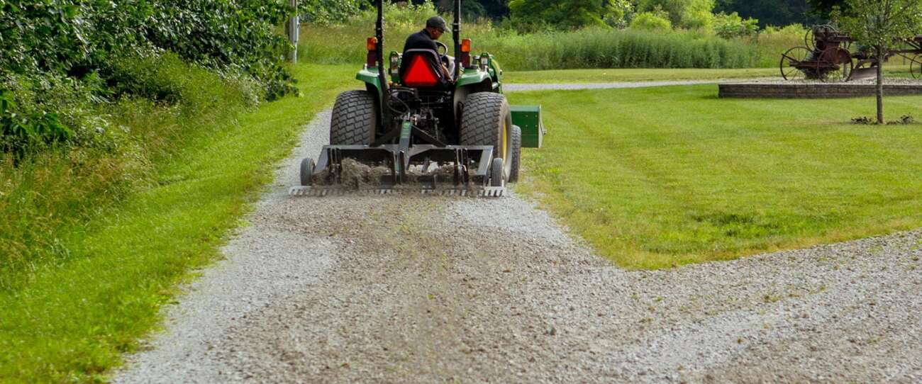 3 Tips For Grading Gravel Lots & Driveways - ABI Attachments