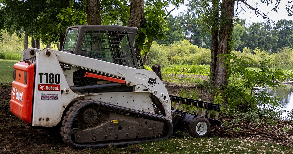 Ground Prep Around a Pond with Skid Steer Attachments